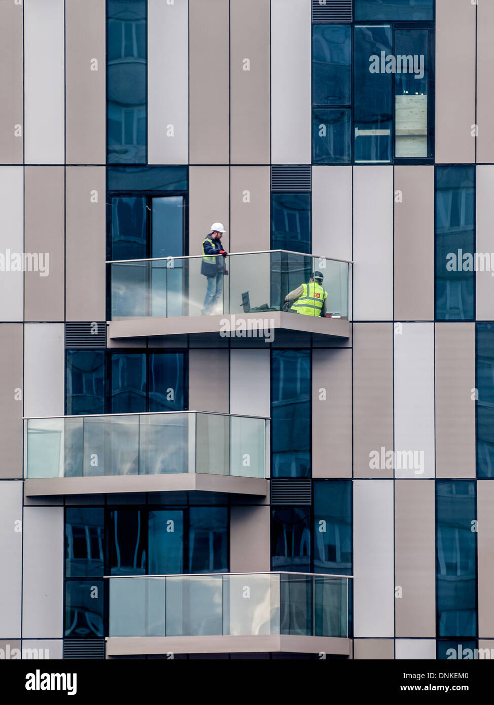 Workmen on the Saffron Square development in central Croydon, London ...