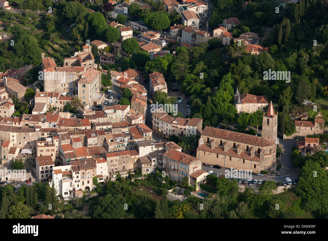 AERIAL VIEW. Perched medieval village crowned with a castle. Callian ...