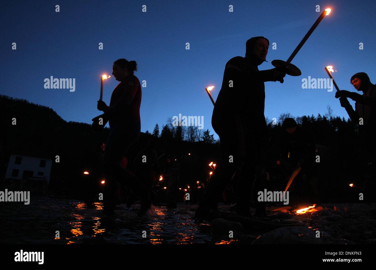 Fuessen, Germany. 01st Jan, 2014. Participants of the traditional torch ...