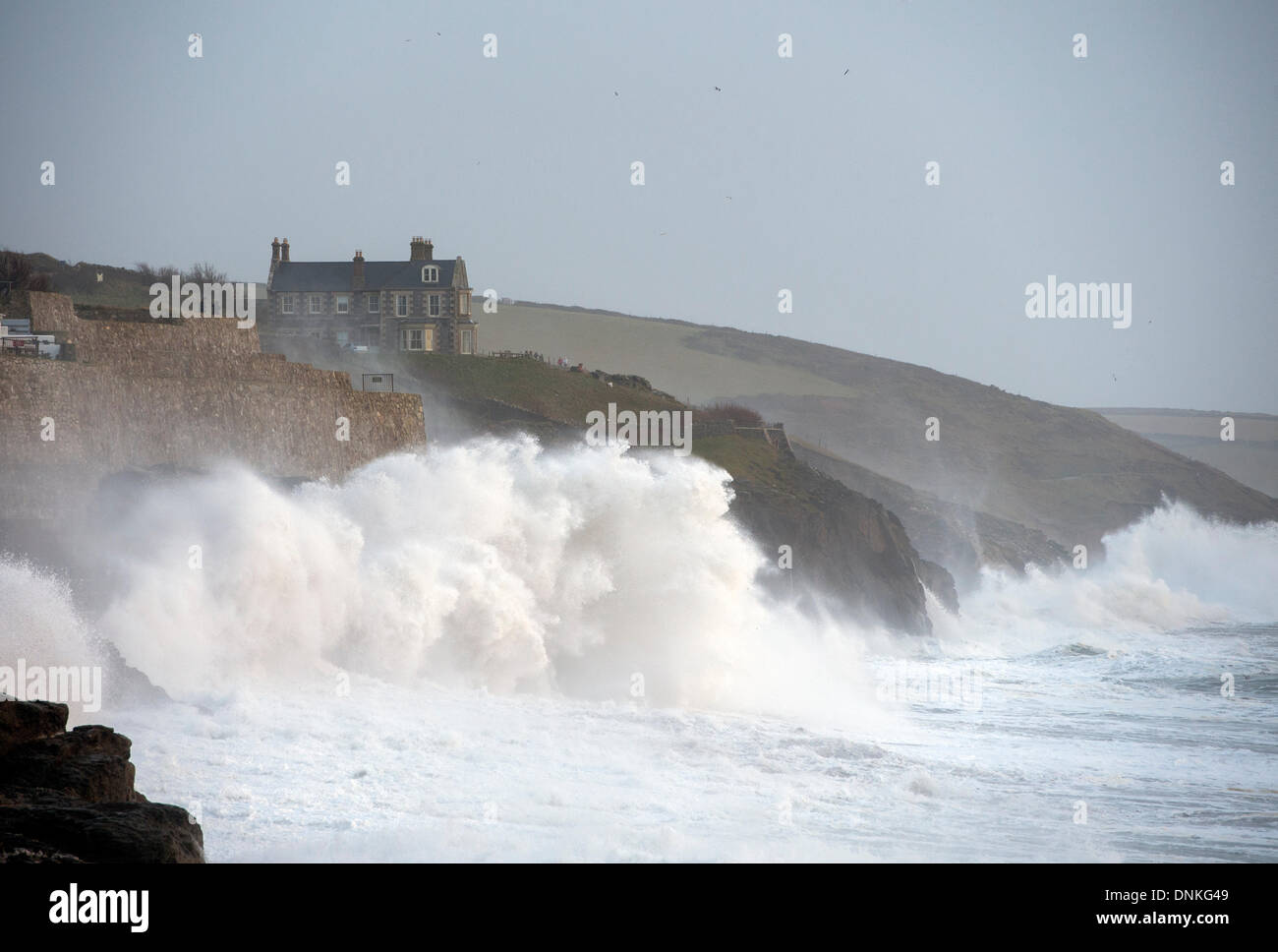 Huge storm waves batter the cliffs Cornish coast at Porthleven Stock ...