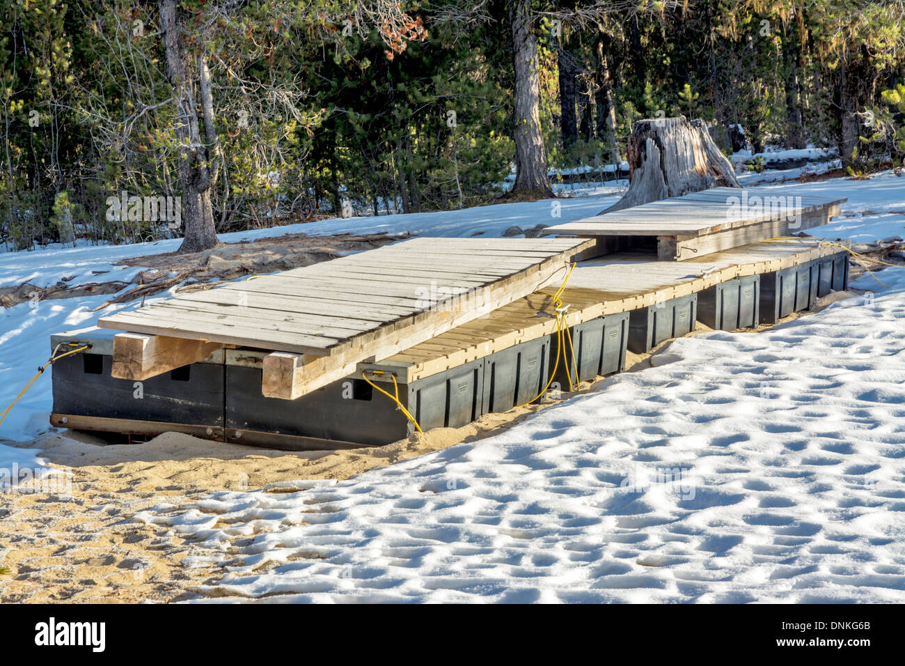 Docks stacked in the snow for winter Stock Photo - Alamy