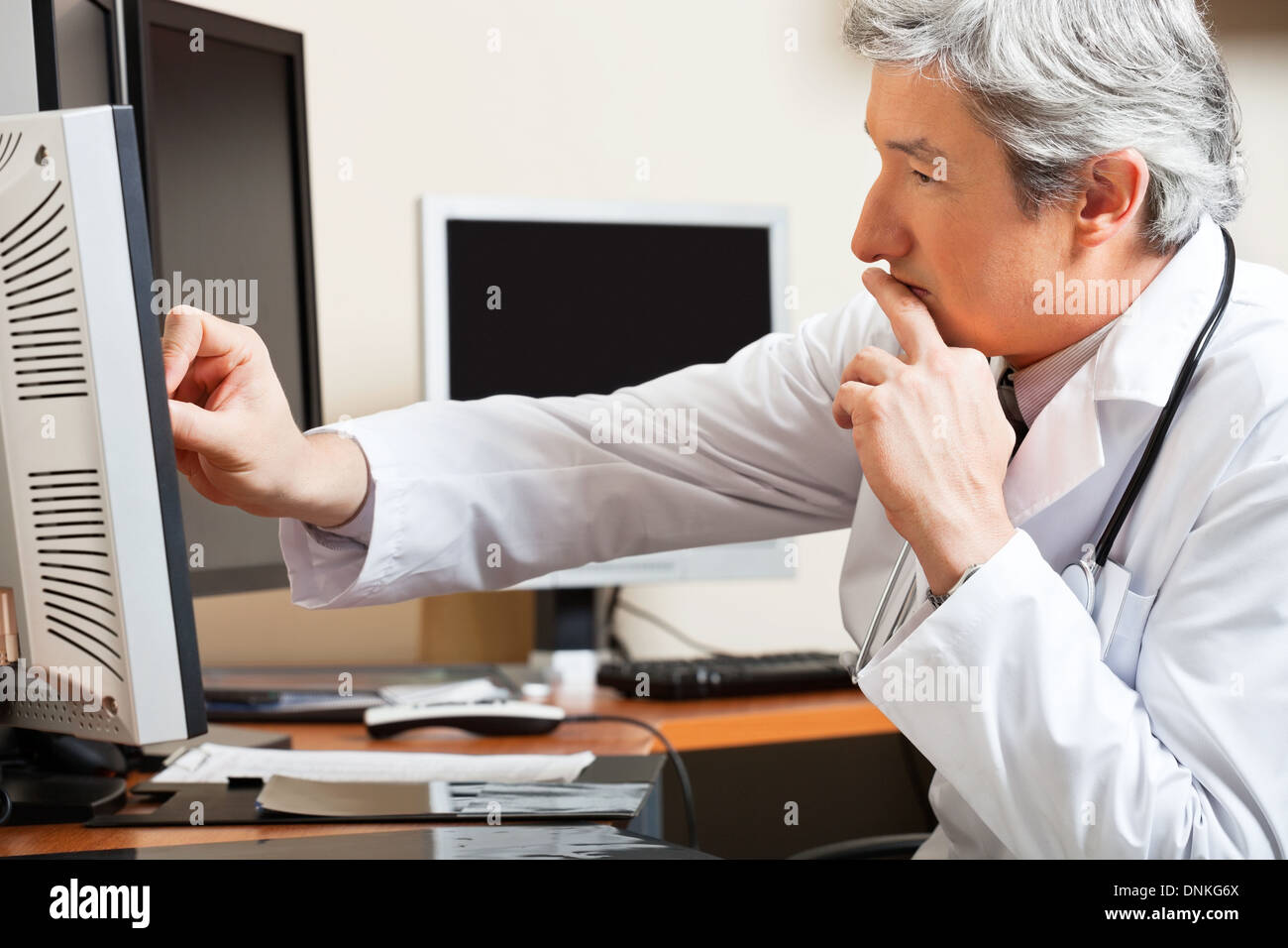 Doctor Working At Clinic Stock Photo - Alamy