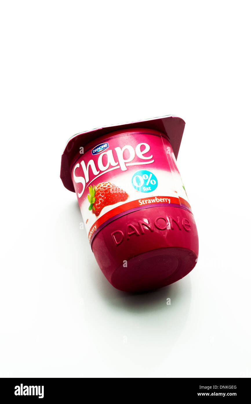 Yogurt shape strawberry flavour carton cut out white background copy ...