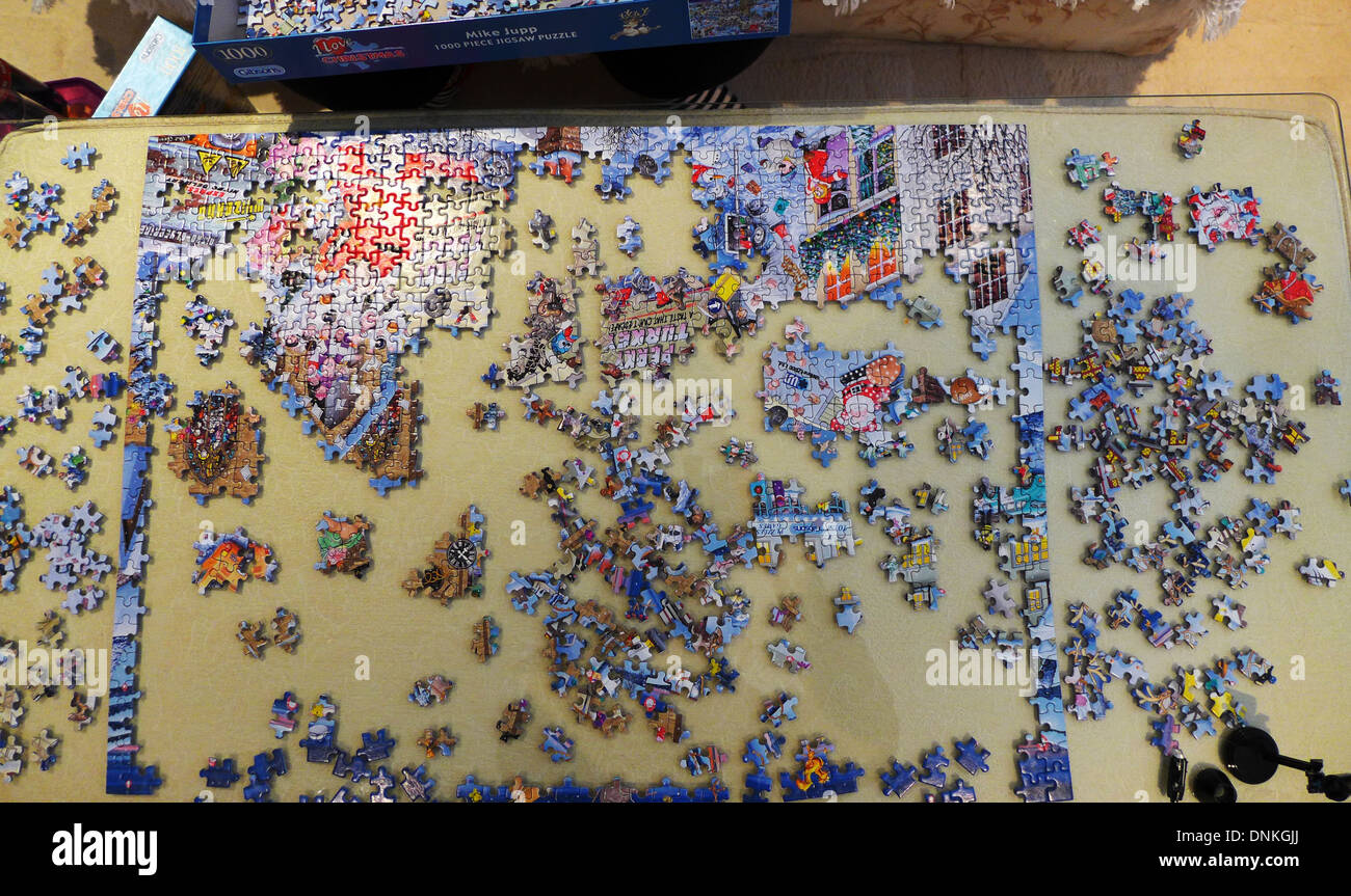 Partially completed jigsaw puzzle being completed Stock Photo: 64969034 ... Partially completed jigsaw puzzle being completed Stock Photo: 64969034 ...