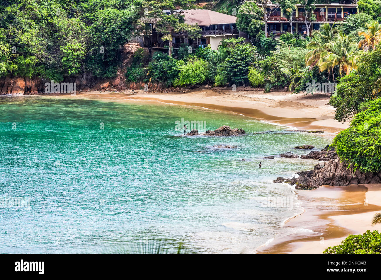 Beach, rocks and bay of Caribbean island village of Castara, Tobago ...