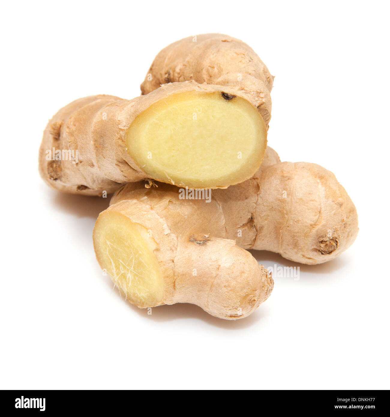 Fresh root ginger isolated on a white studio background Stock Photo - Alamy