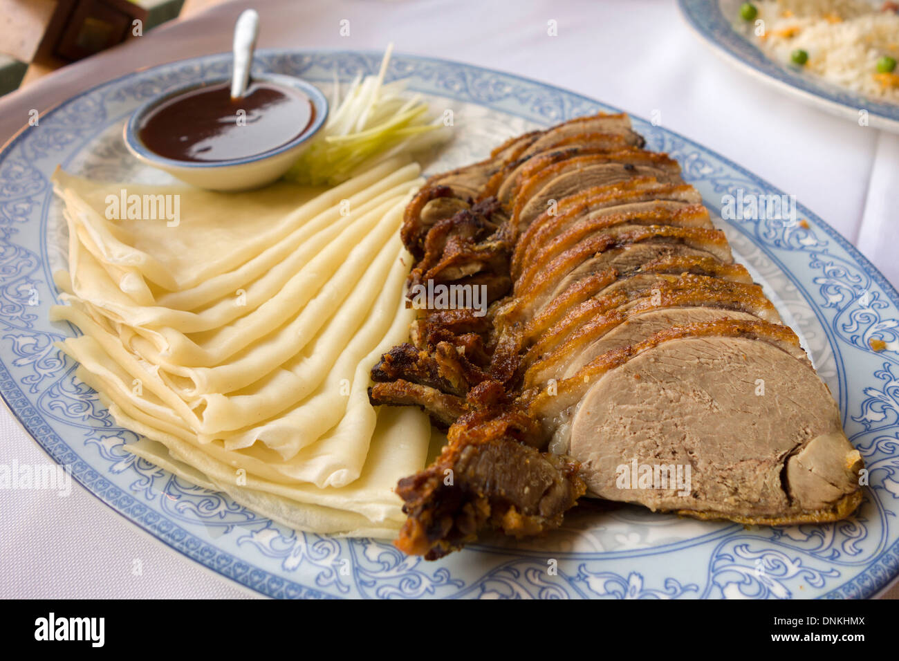 Chinese food on a plate - Peking duck Stock Photo - Alamy