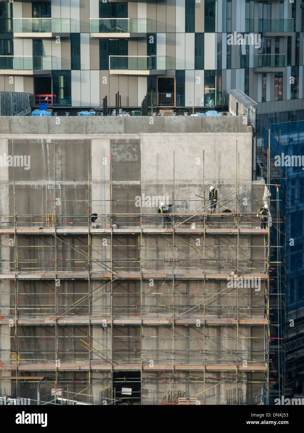 Workmen on the Saffron Square development in central Croydon, London ...
