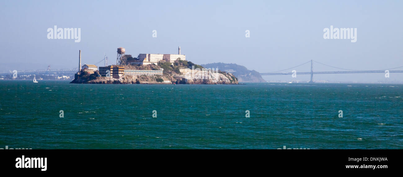 Alcatraz jail in San Francisco bay and Bay Bridge Stock Photo - Alamy