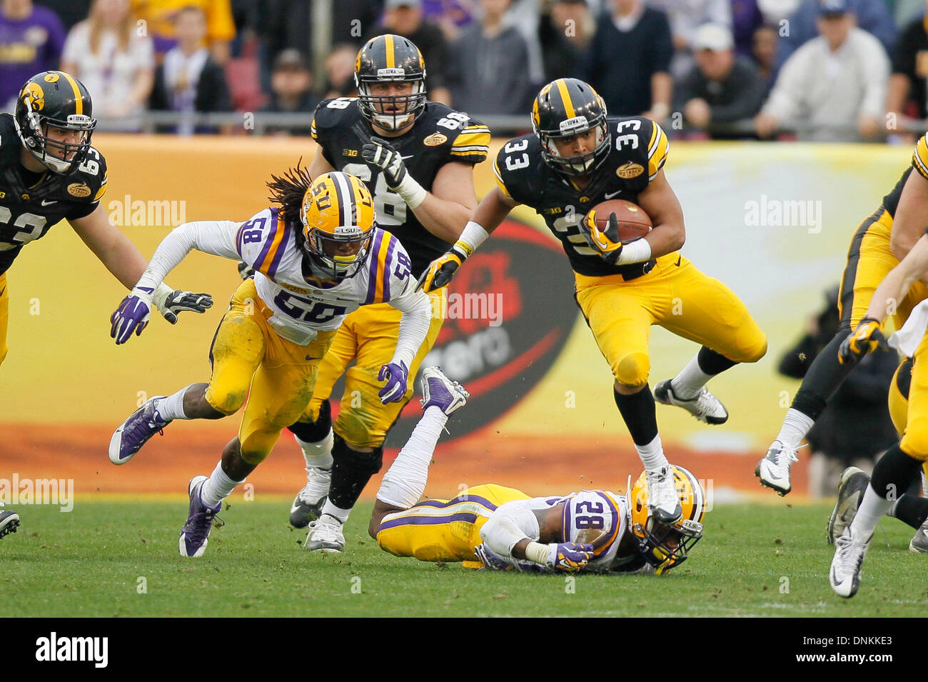 Tampa, Florida, USA. 1st Jan, 2014. EVE EDELHEIT | Times.Iowa Hawkeyes ...