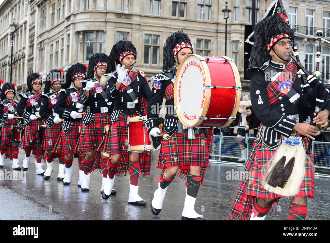 London, UK. 1st January 2014. Tens of thousands of people braved ...