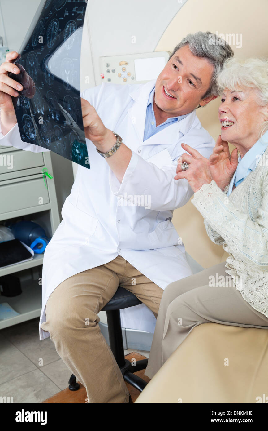 Radiologist Explaining X-ray To Patient Stock Photo - Alamy