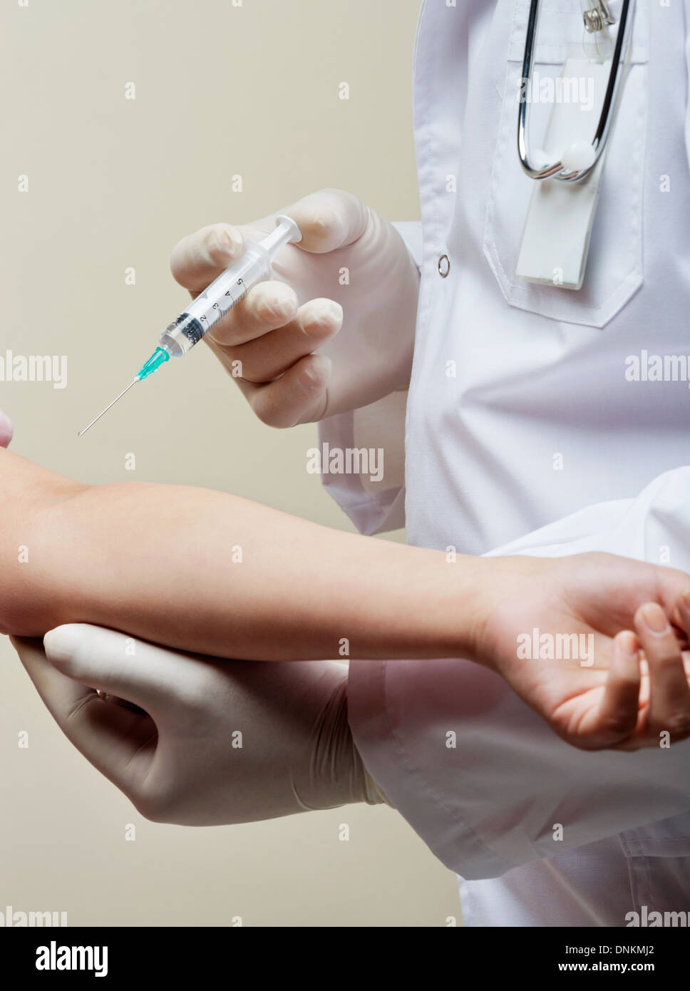 Medicine Injection in Arm Stock Photo - Alamy