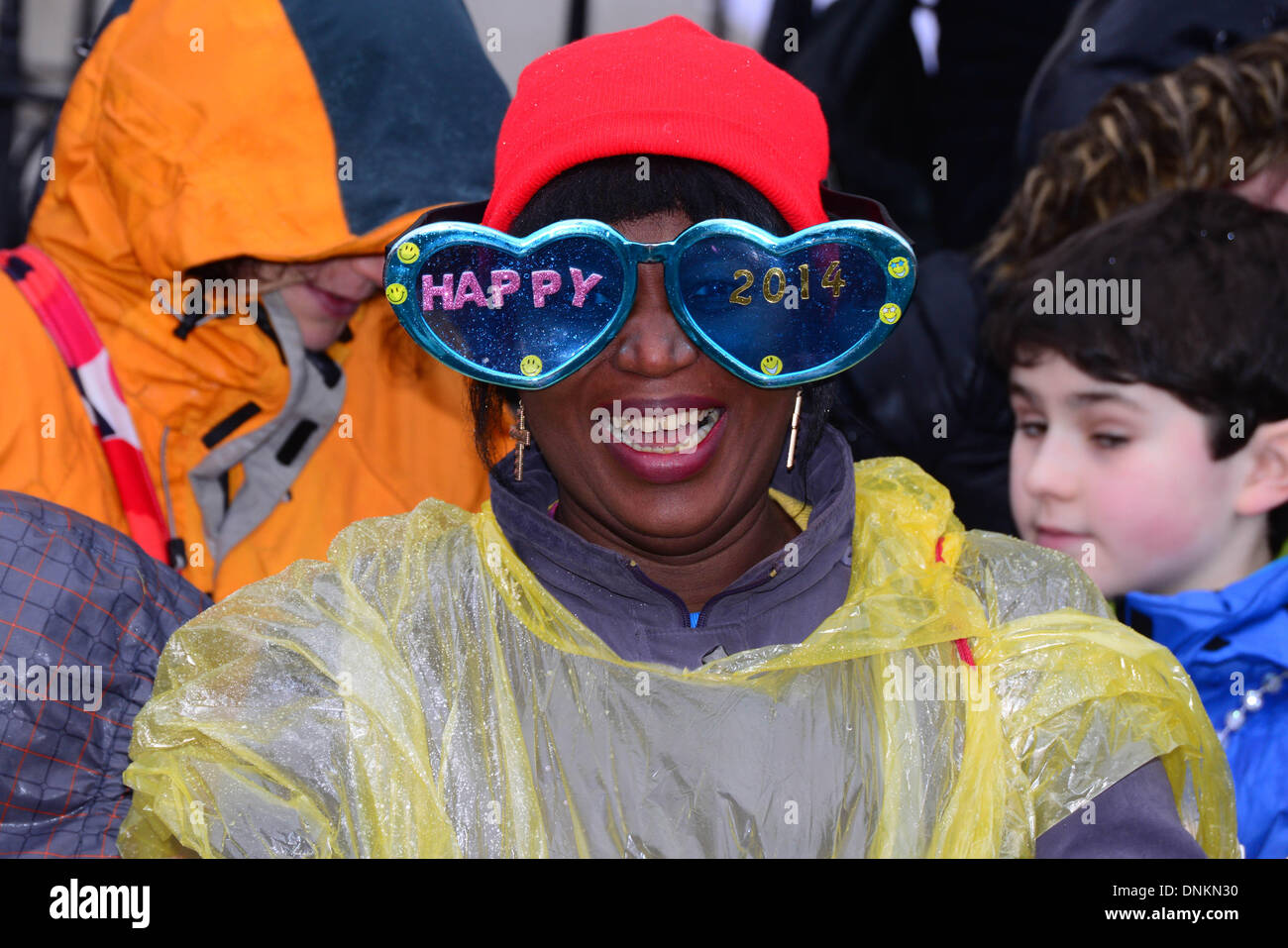 London, UK. 1st January 2014. Tens of thousands of people braved ...