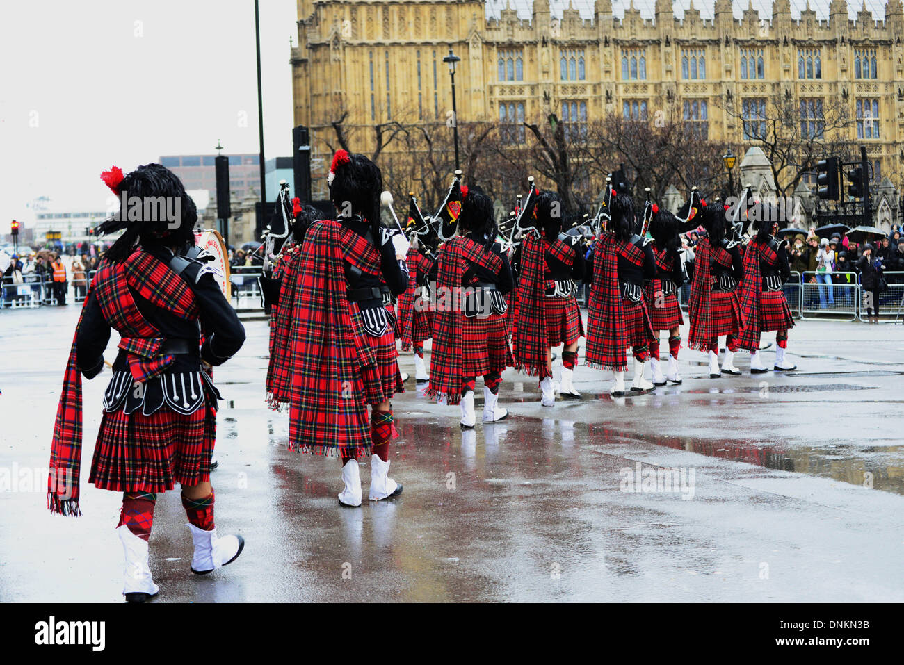 London, UK. 1st January 2014. Tens of thousands of people braved ...