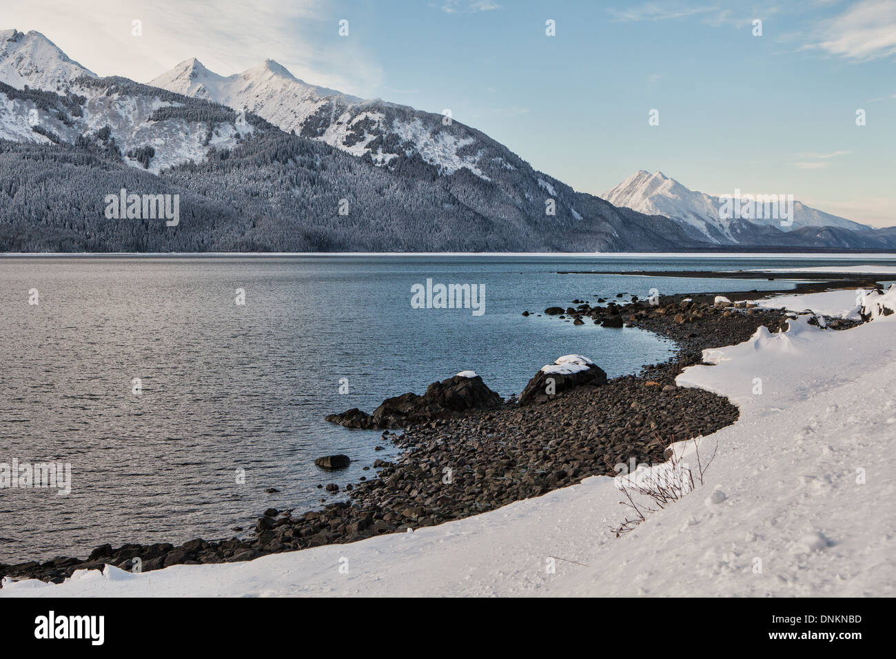 Snow on the beach of the Chilkat Inlet in Southeast Alaska with ...