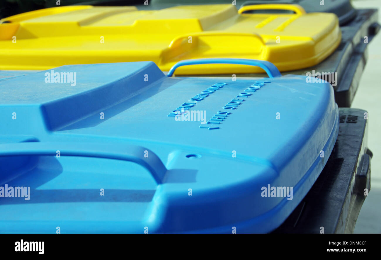 coloured plastic rubbish bins Stock Photo - Alamy