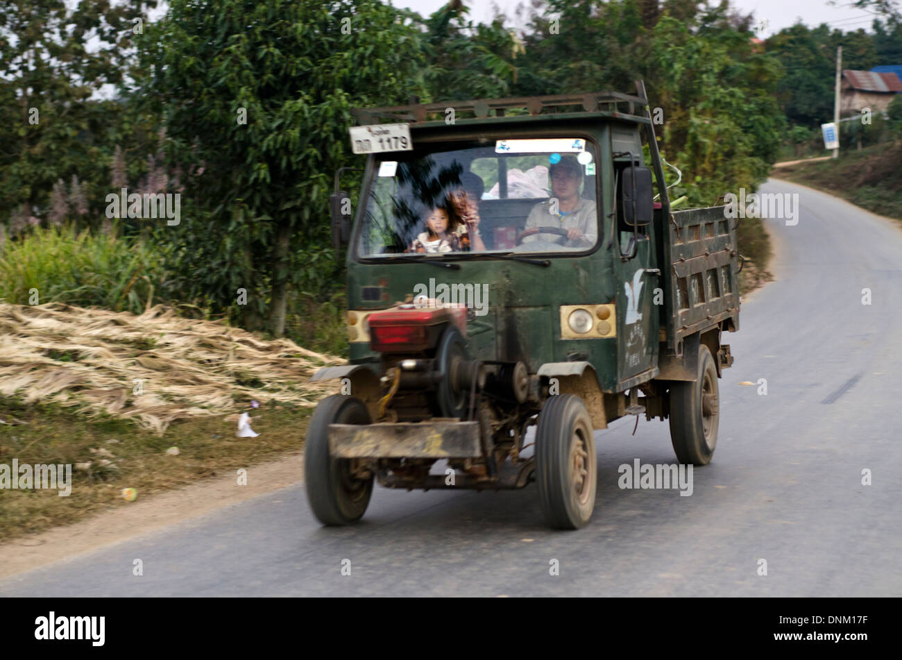 Tractor on the road ,Muang Long ,Northern Laos Stock Photo - Alamy
