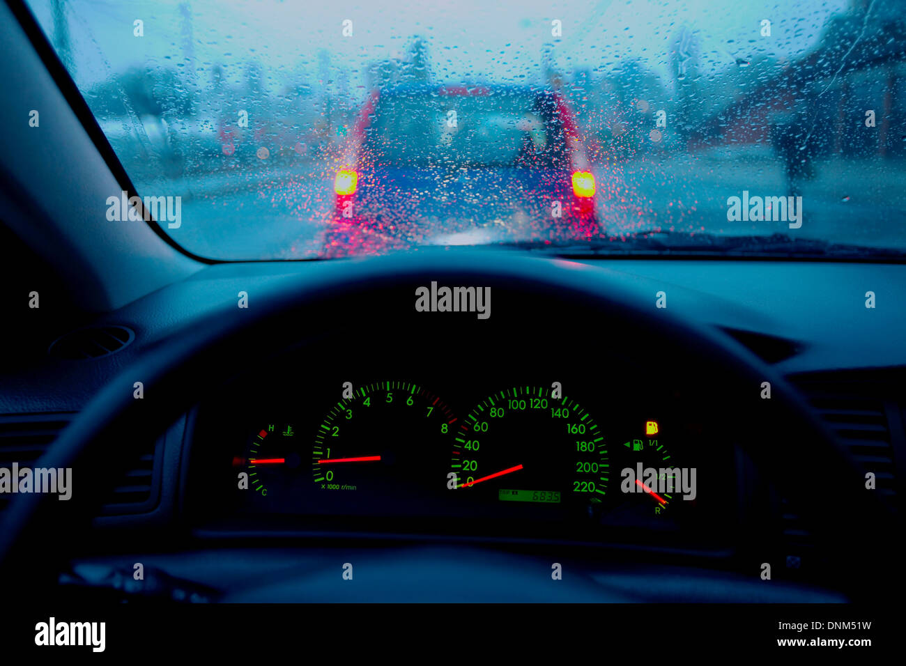 Driving in rain Stock Photo - Alamy