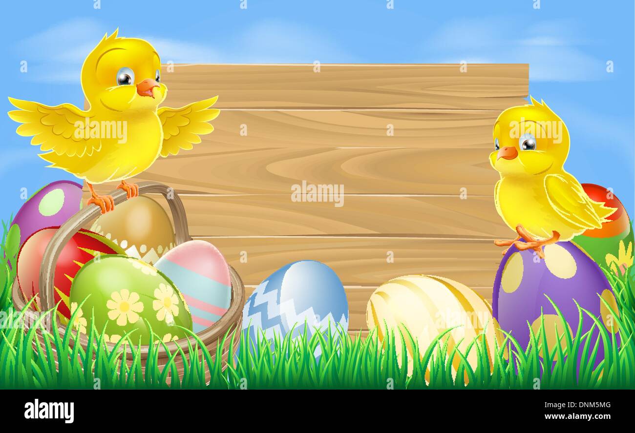 A blank wooden Easter egg sign with Easter eggs in a wooden hamper ...