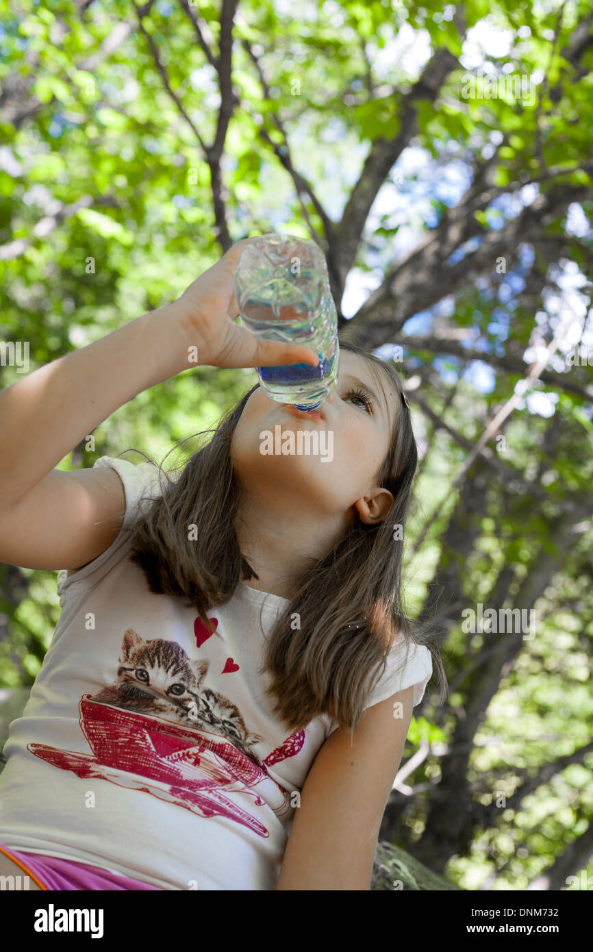 Girl drinking water Stock Photo - Alamy