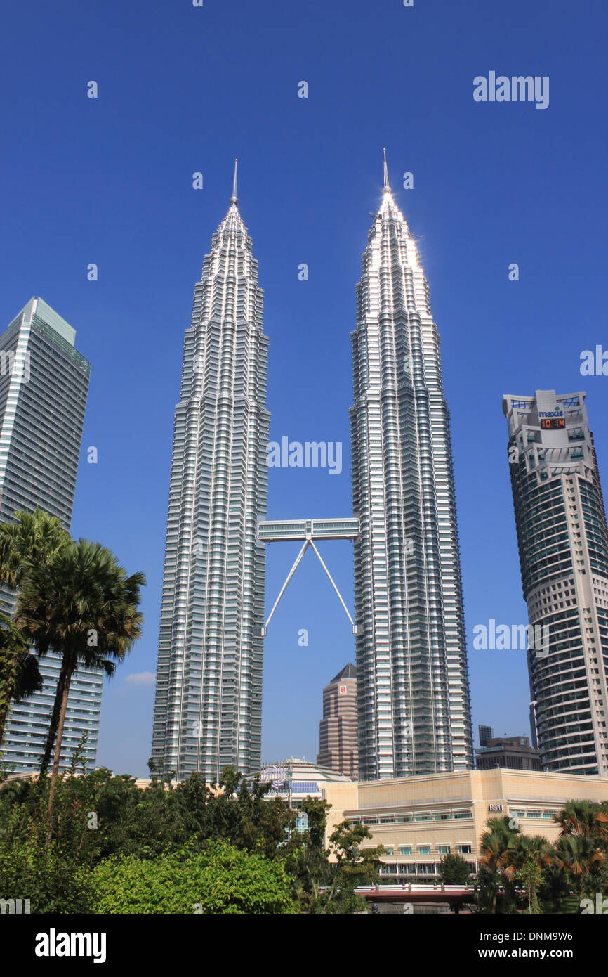 A photograph of the Petronas Towers in Kuala Lumpur taken on a sunny ...