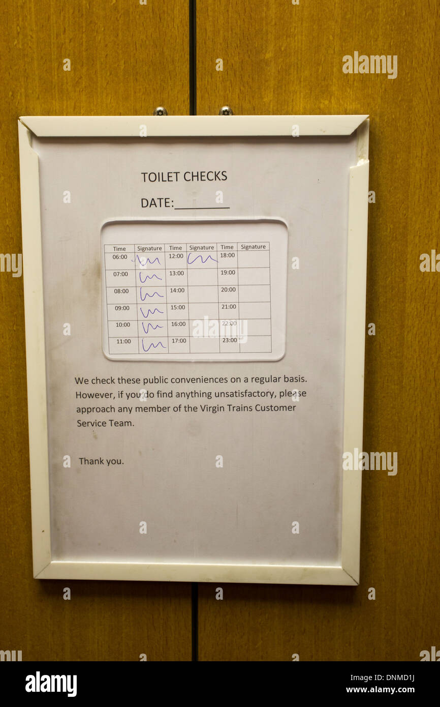 toilet check sign in railway station toilet Stock Photo - Alamy
