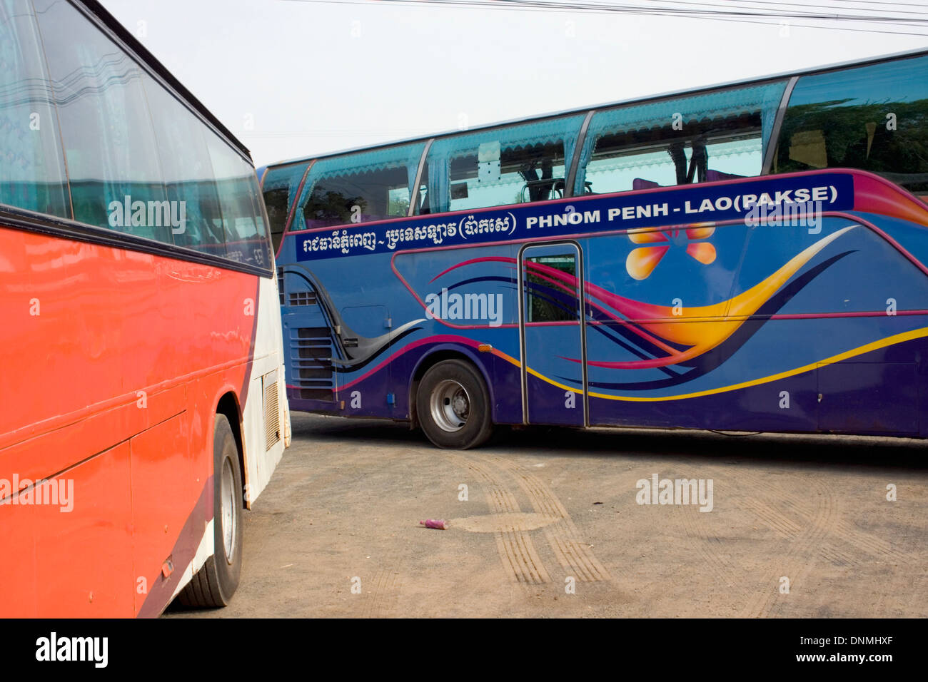 Colorful buses are transporting passengers to their destinations from a ...