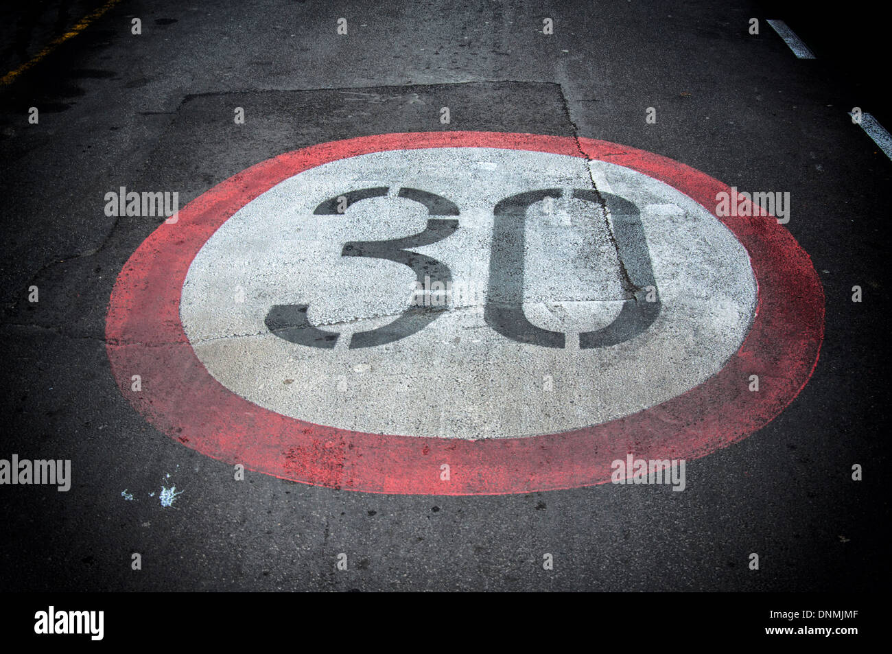 Sign for the speed limit on road Stock Photo - Alamy