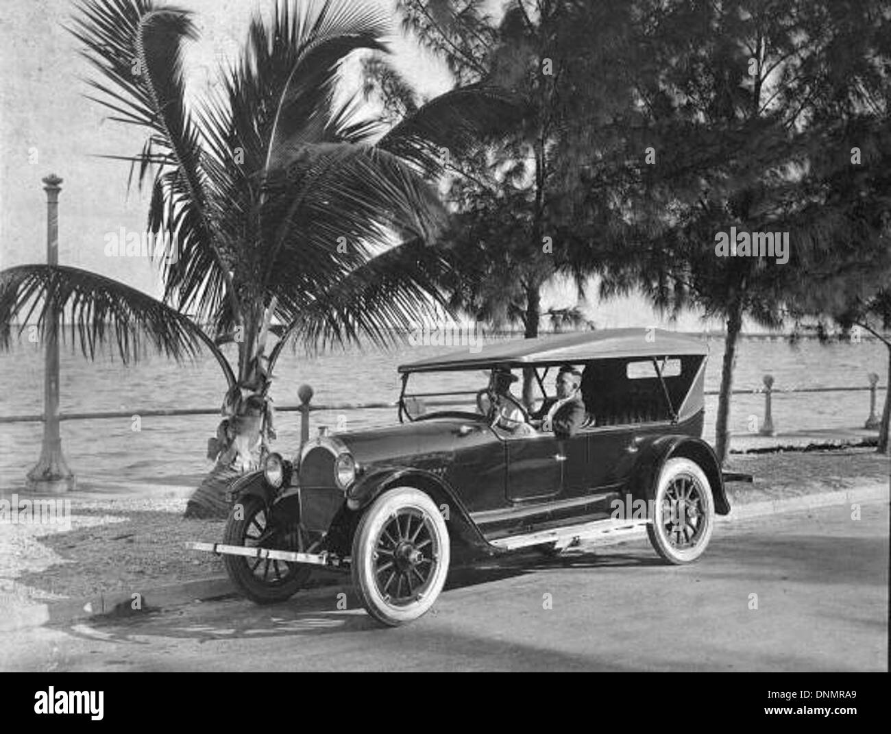 A group of men are seen in a car near Miami, Florida, in the 1920s ...