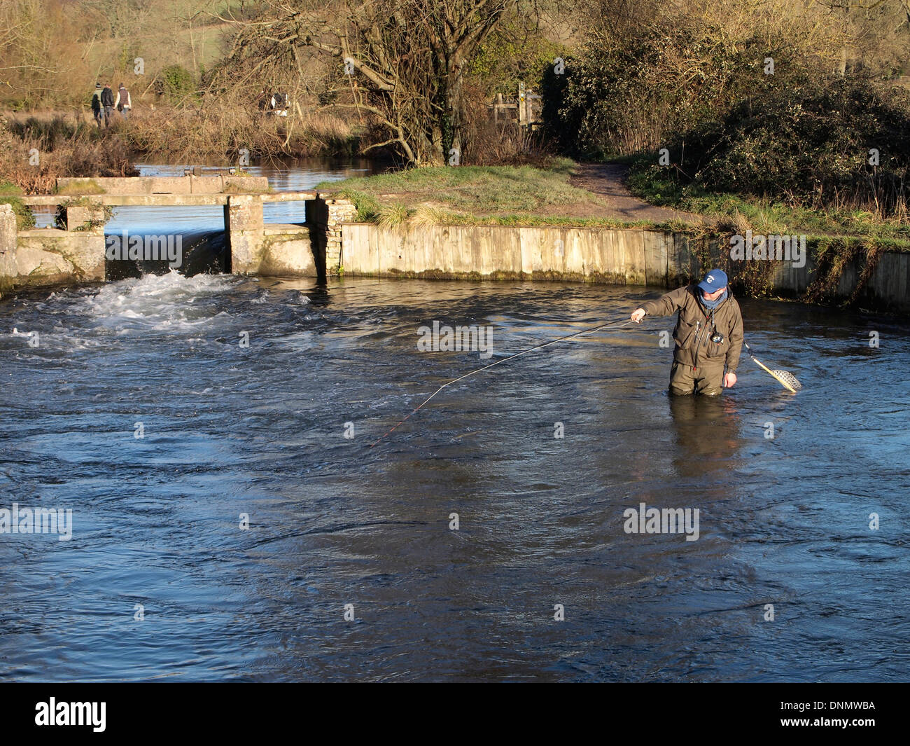 An angler fishing for coarse fish on the Itchen Navigation below the ...