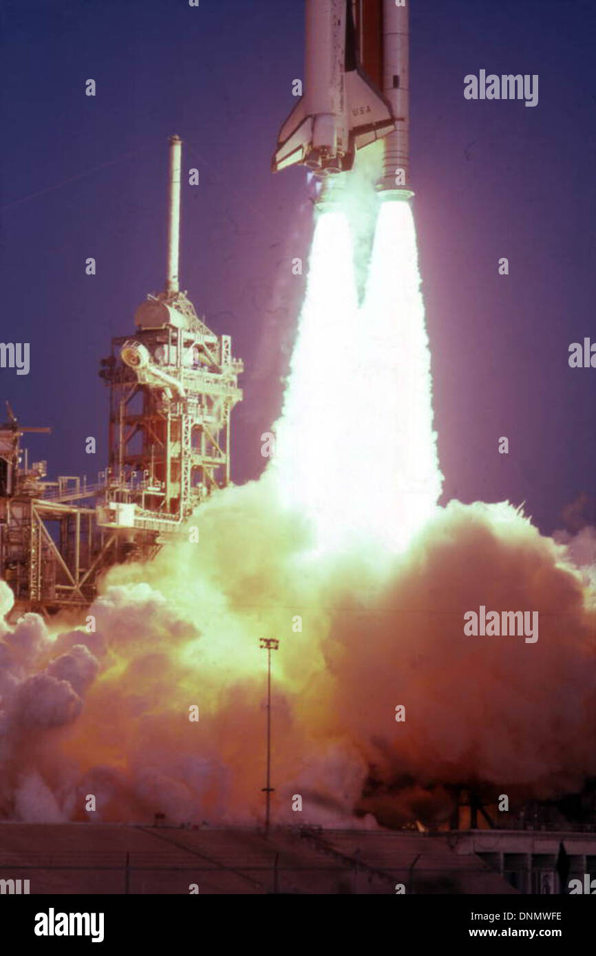 A Space Shuttle launch at Kennedy Space Center in the 1980s, captured ...