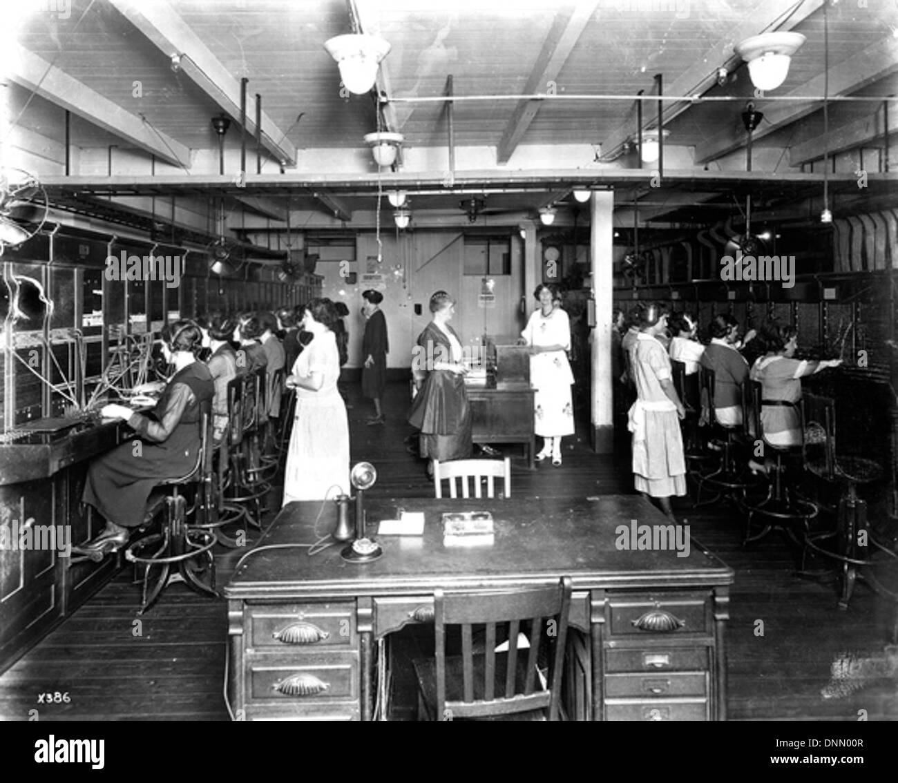 Employees of the Southern Bell & Telegraph Company are pictured working ...