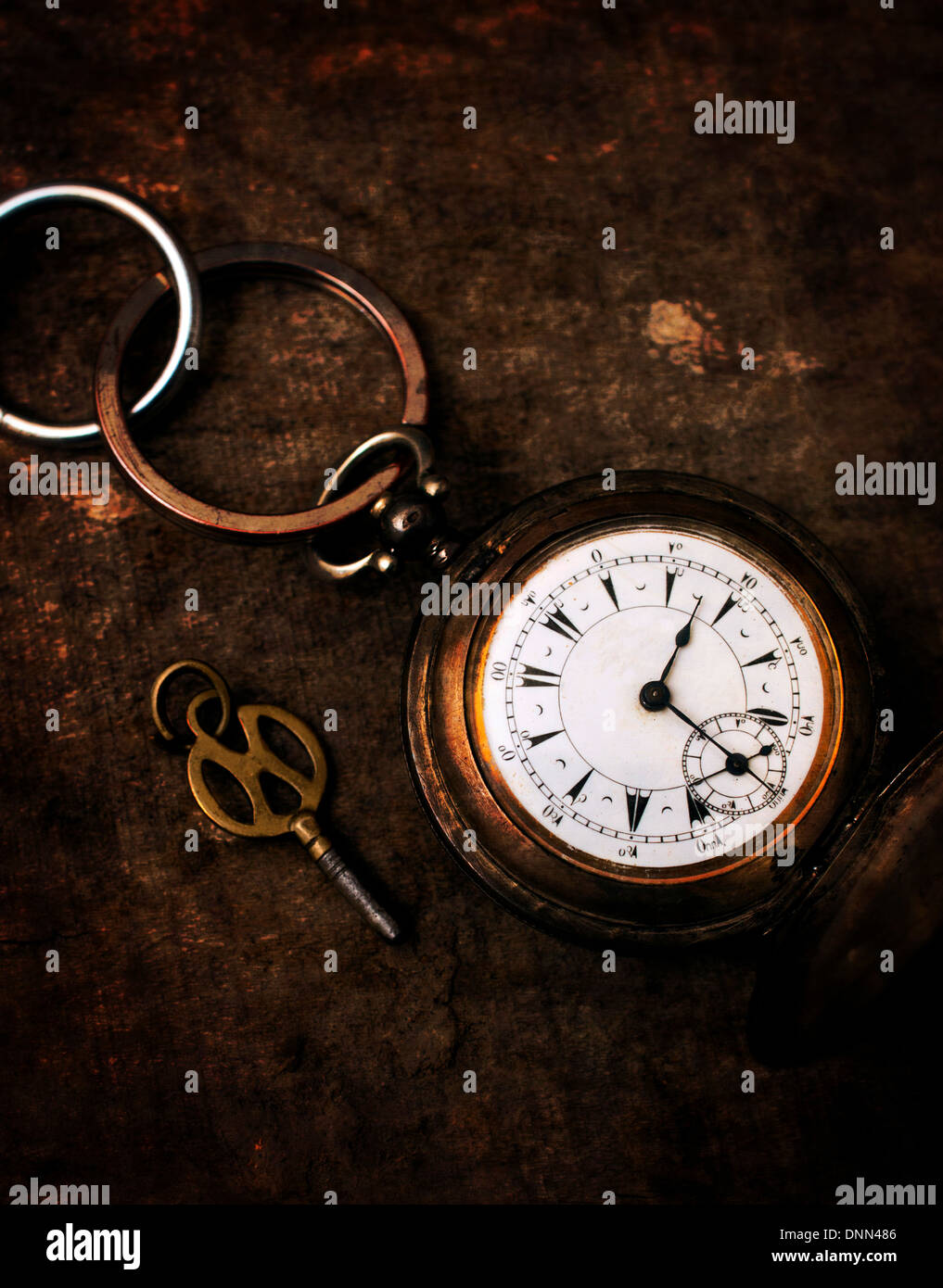 Old vintage pocket watch on the wooden table from above Stock Photo - Alamy