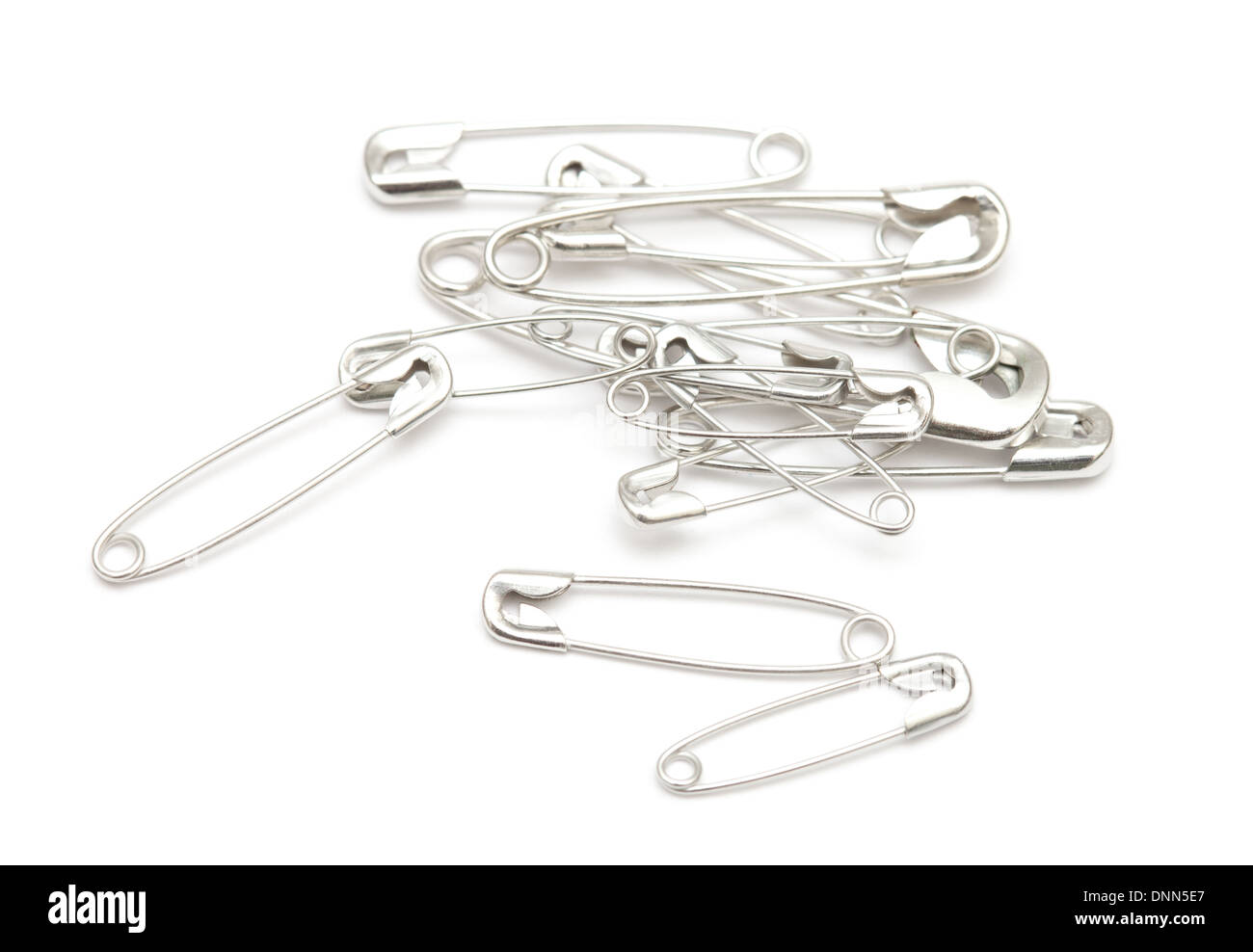Closed safety pins hi-res stock photography and images - Alamy