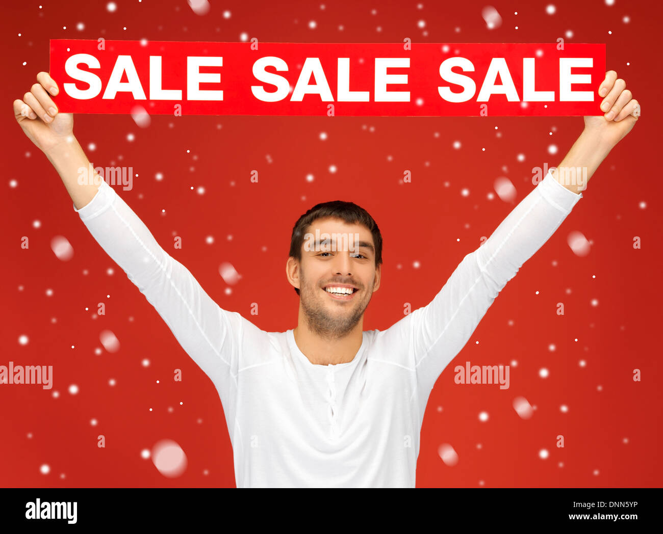handsome man with sale sign Stock Photo - Alamy