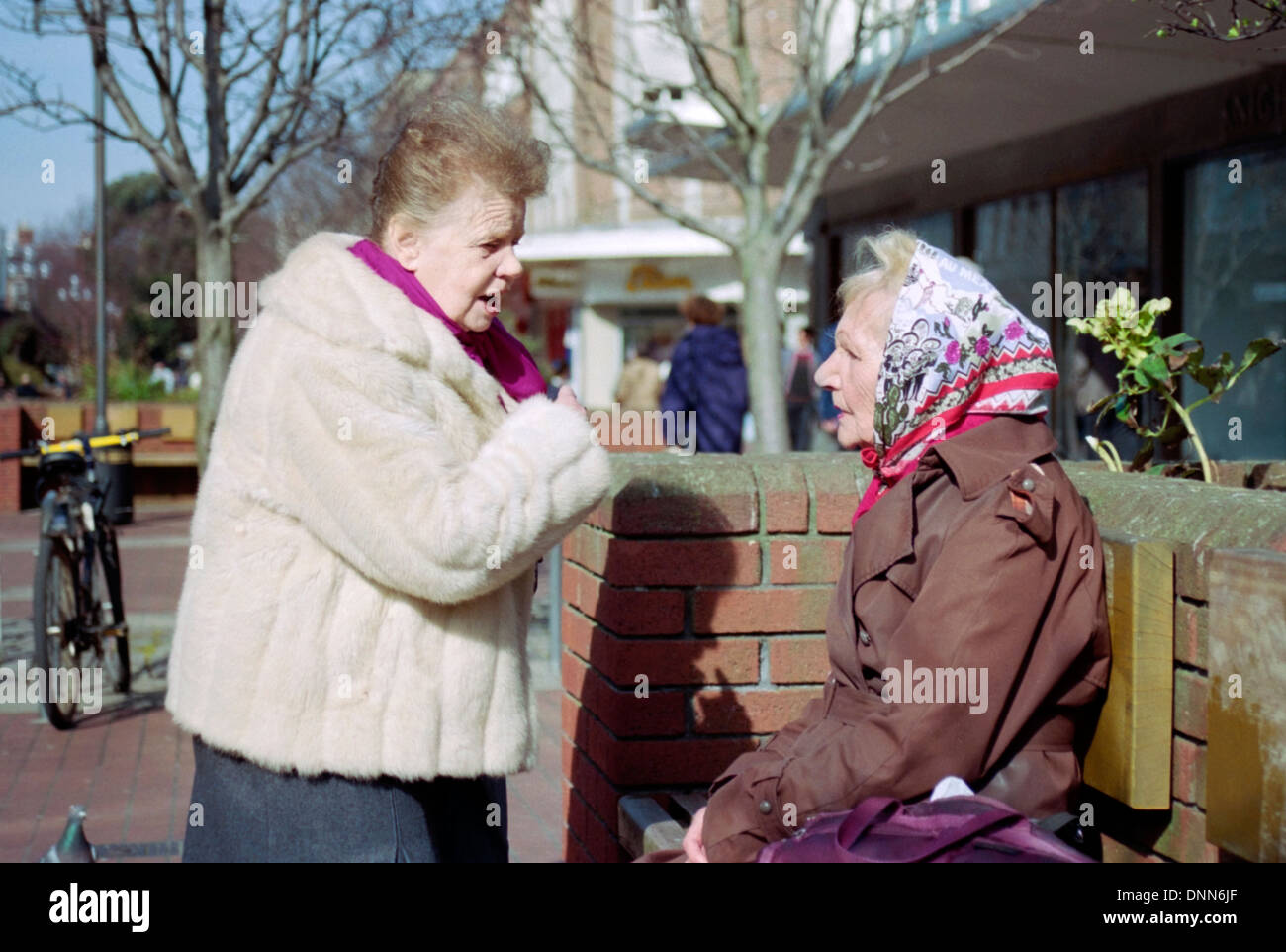 Two elderly women talking gossip hi-res stock photography and images ...