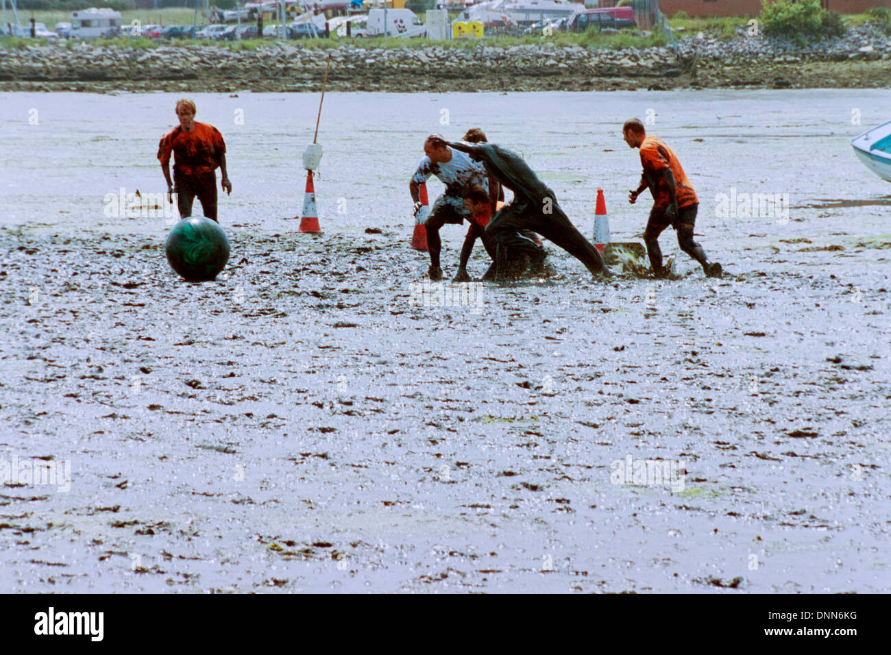 traditional game of mud football on langstone locks mud flats ...