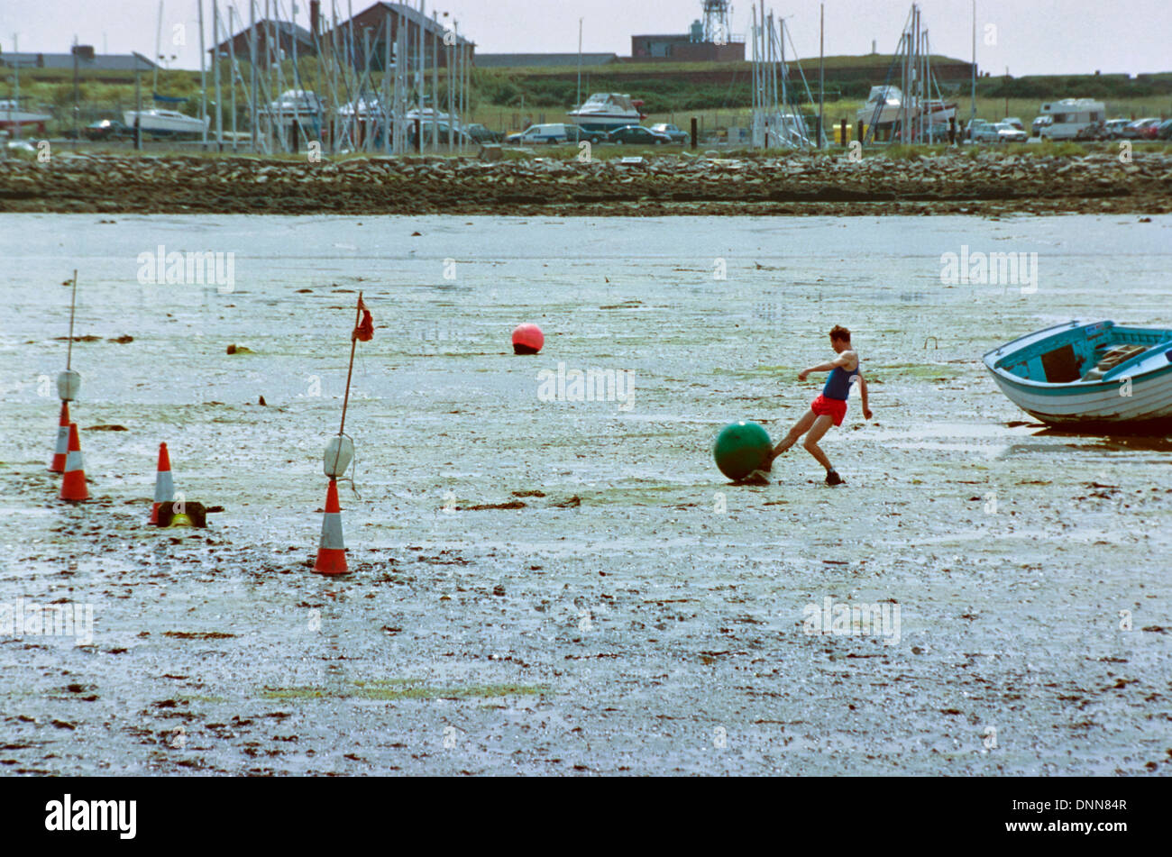 traditional game of mud football on langstone locks mud flats ...