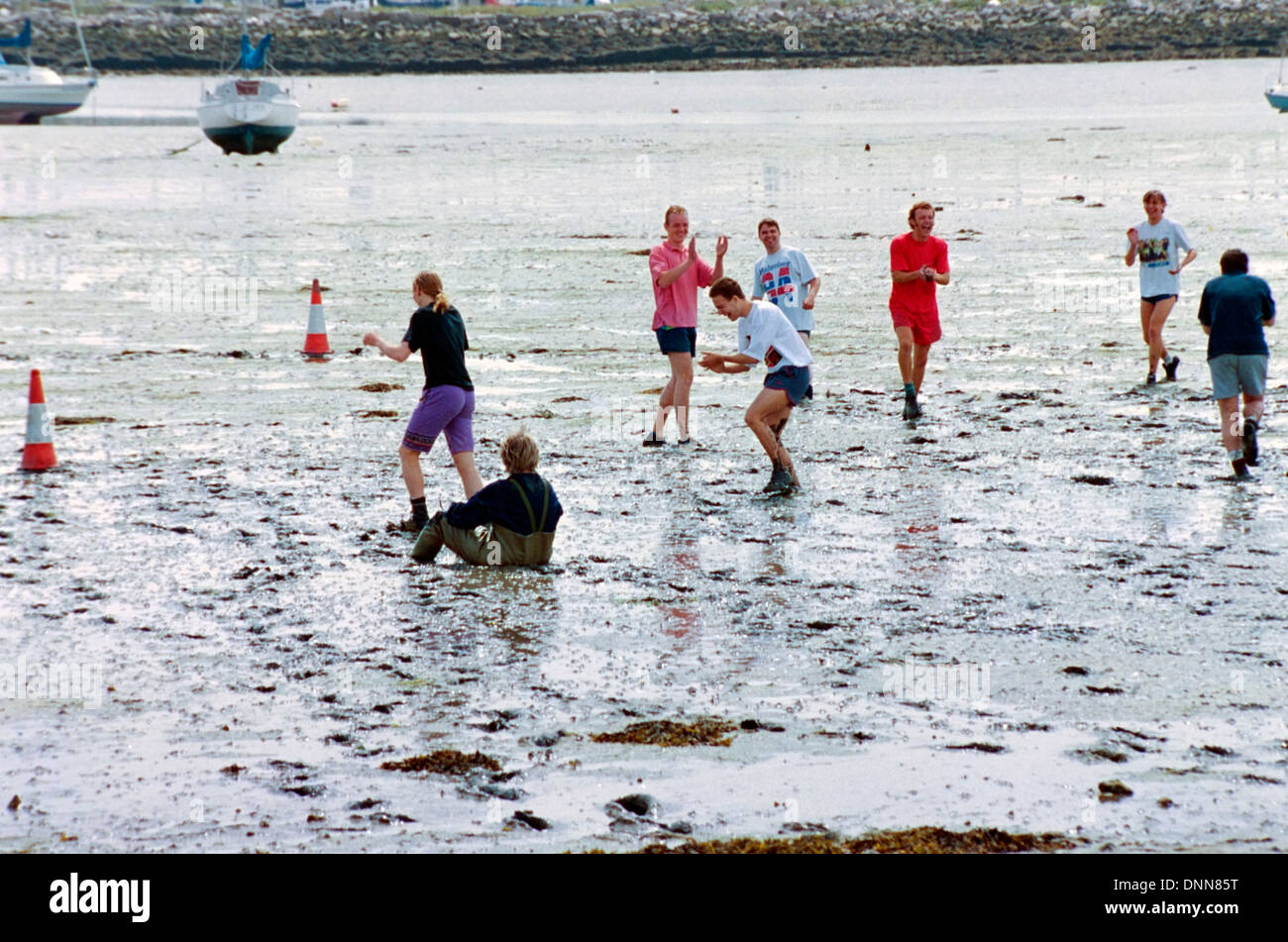 traditional game of mud football on langstone locks mud flats ...