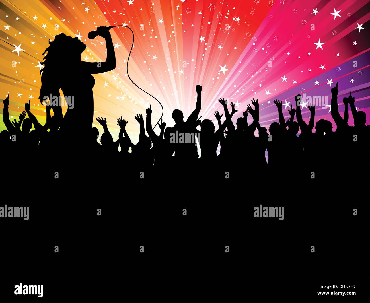 Silhouette of a female singer performing in front of a cheering ...