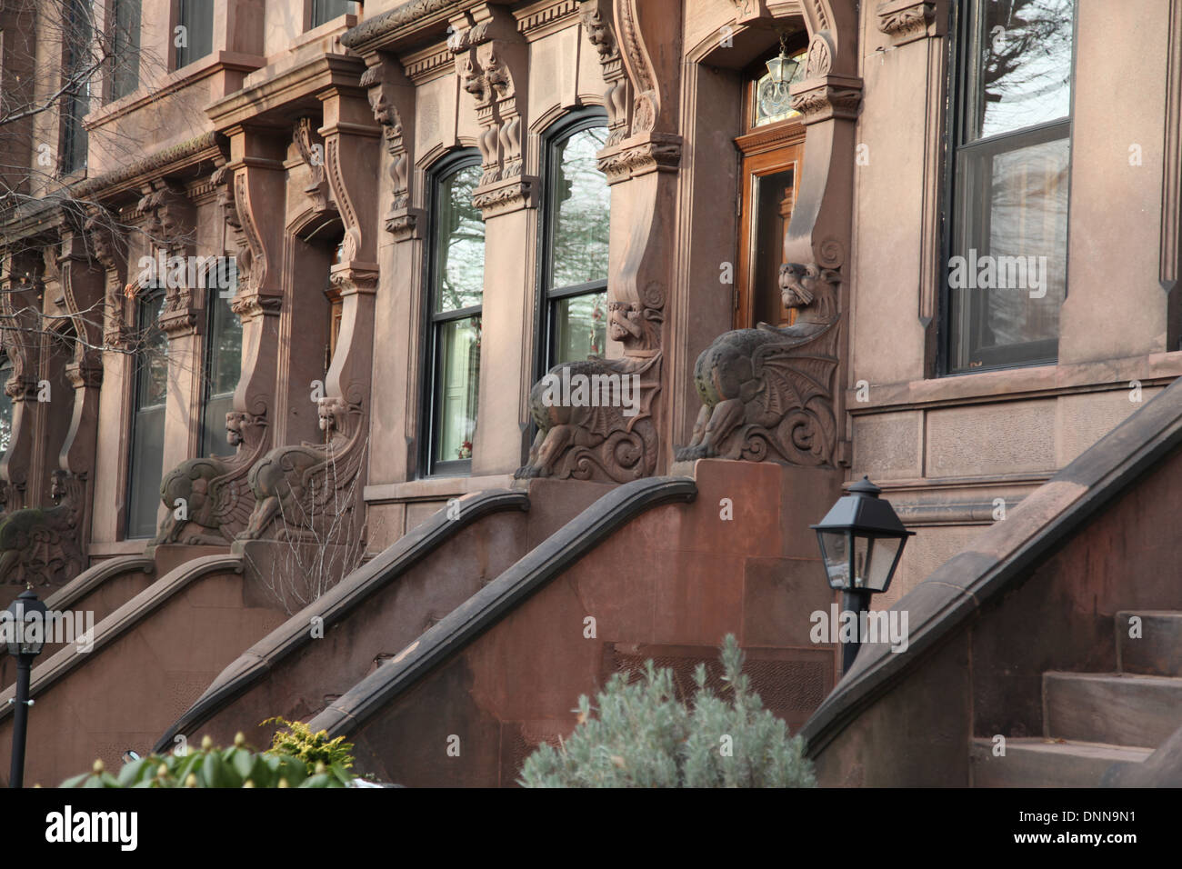 Entrances to high stoop brownstones on a residential street in Park ...