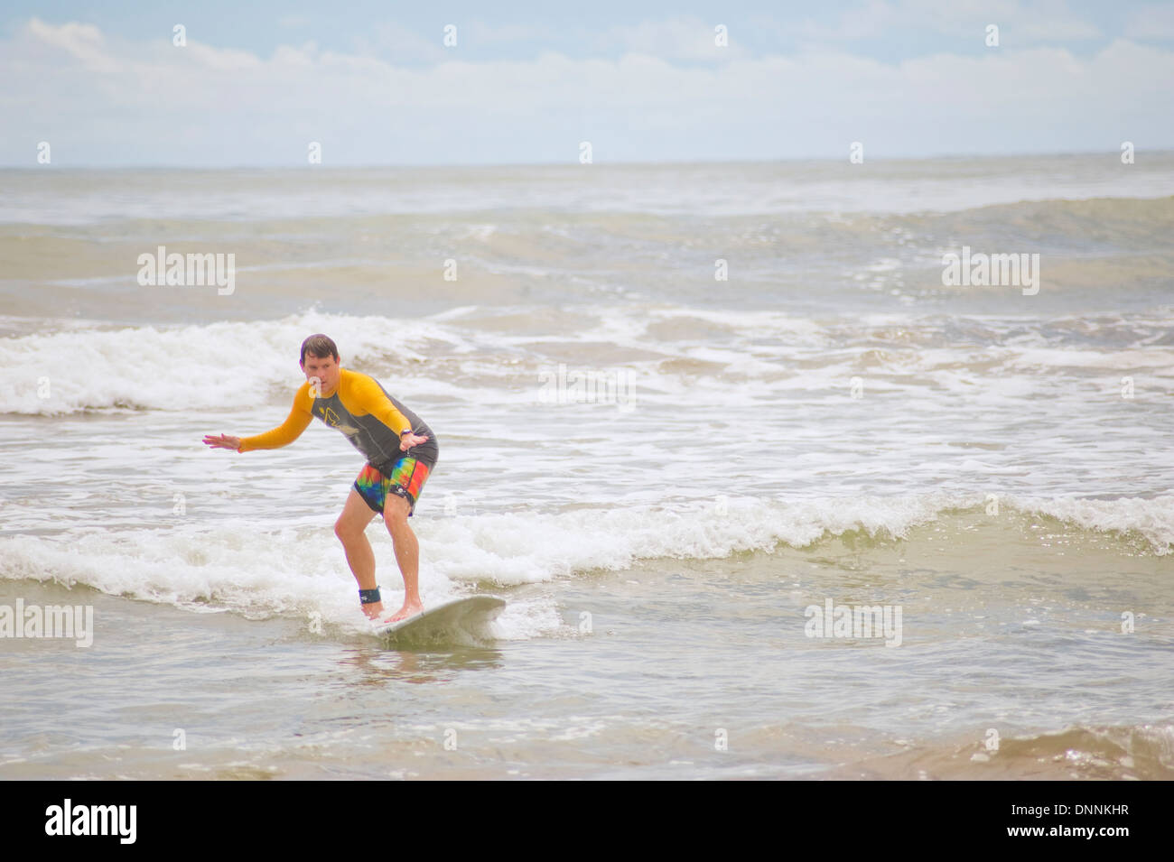 Surfing on the beaches of Dominical, Costa Rica Stock Photo - Alamy