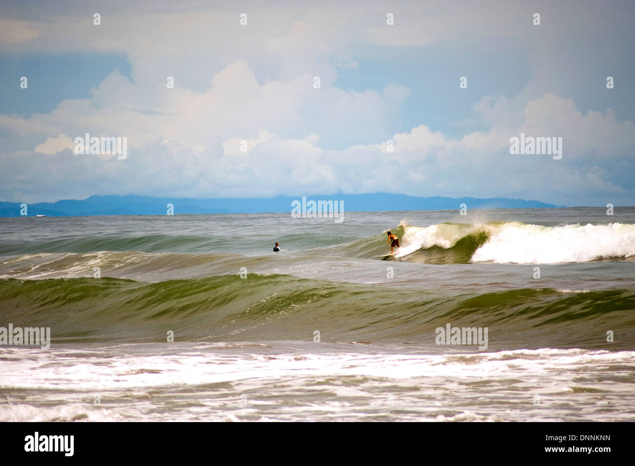 Surfing on the beaches of Dominical, Costa Rica Stock Photo - Alamy