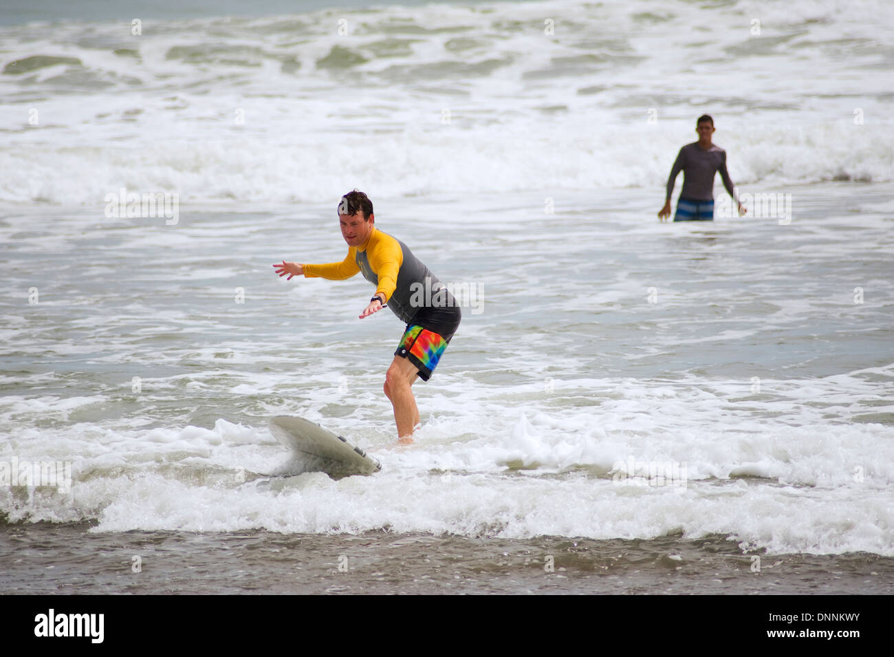 Surfing on the beaches of Dominical, Costa Rica Stock Photo - Alamy