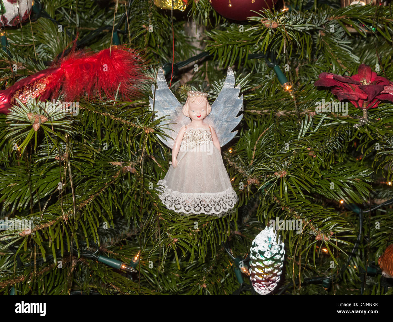 Christmas tree decorations, with traditional plastic fairy with silver ...