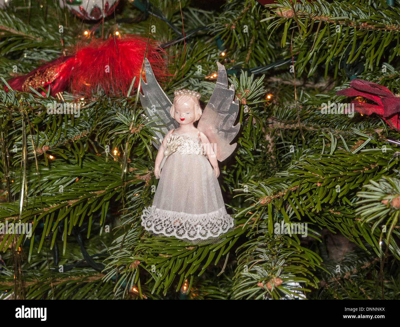 Christmas tree decorations, with traditional plastic fairy with silver ...