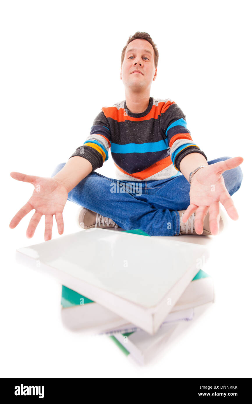 Portrait man male college student sitting and showing offering books ...