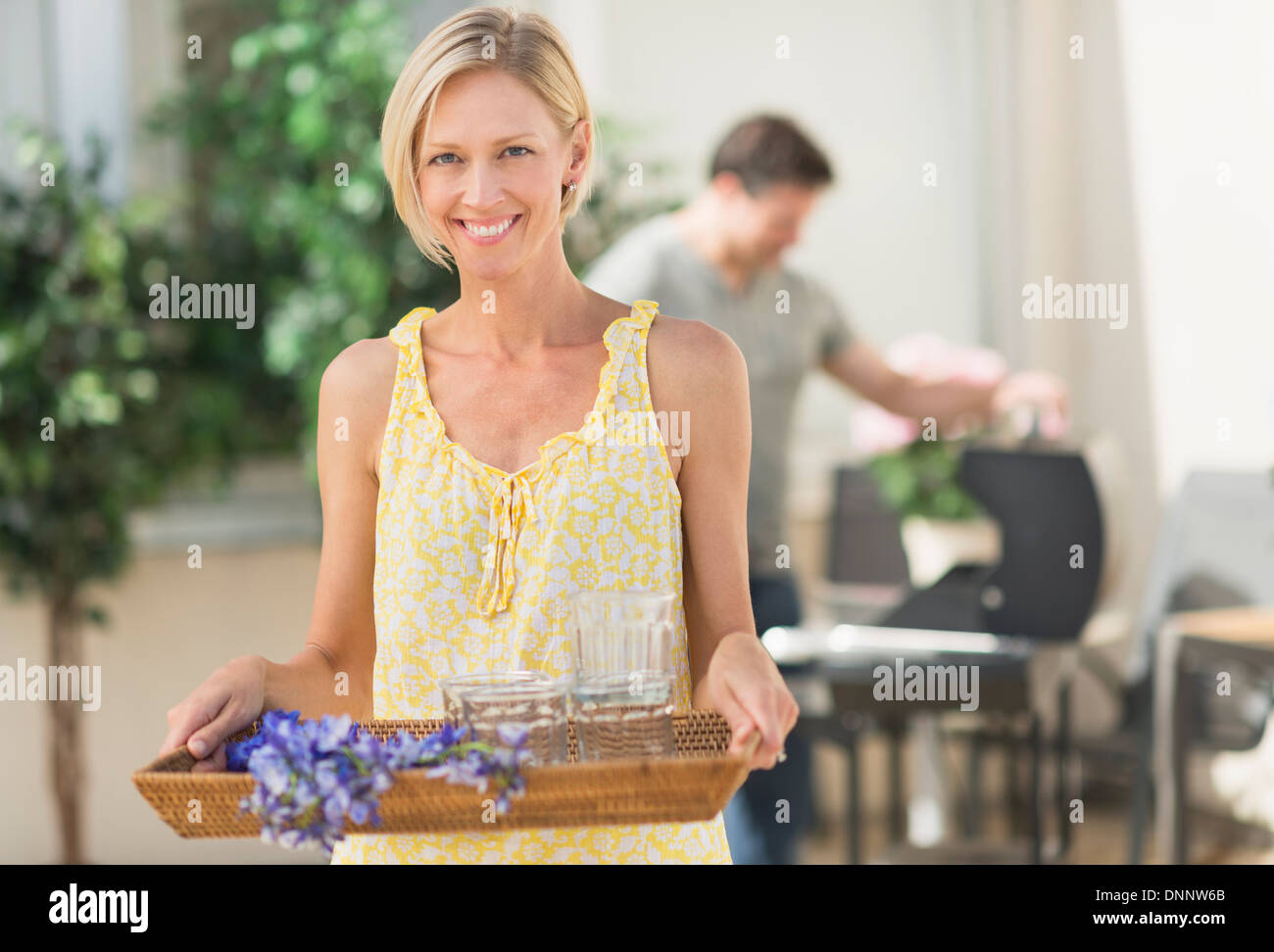 Woman holding tray food hi-res stock photography and images - Alamy
