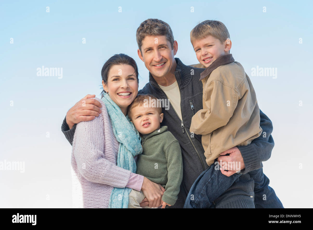 Caucasian family parents two kids hi-res stock photography and images ...